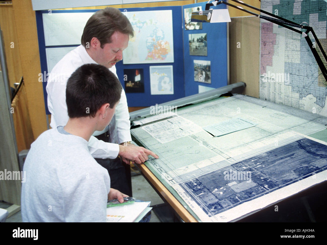 Student at alternative tech ed center studies drafting as possible ...