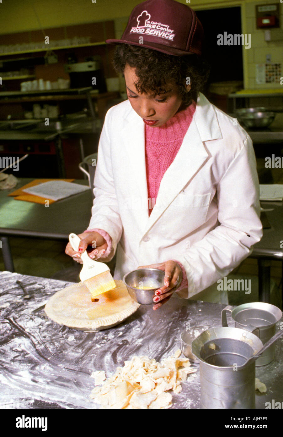 Black female prepares food in Vocational education High School Fast ...