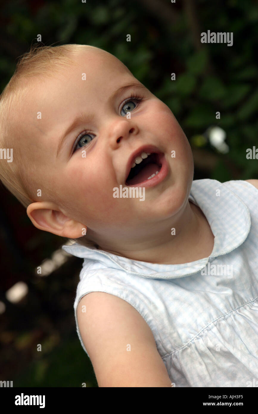 baby girl 1 year old head and shoulders outdoors Stock Photo - Alamy