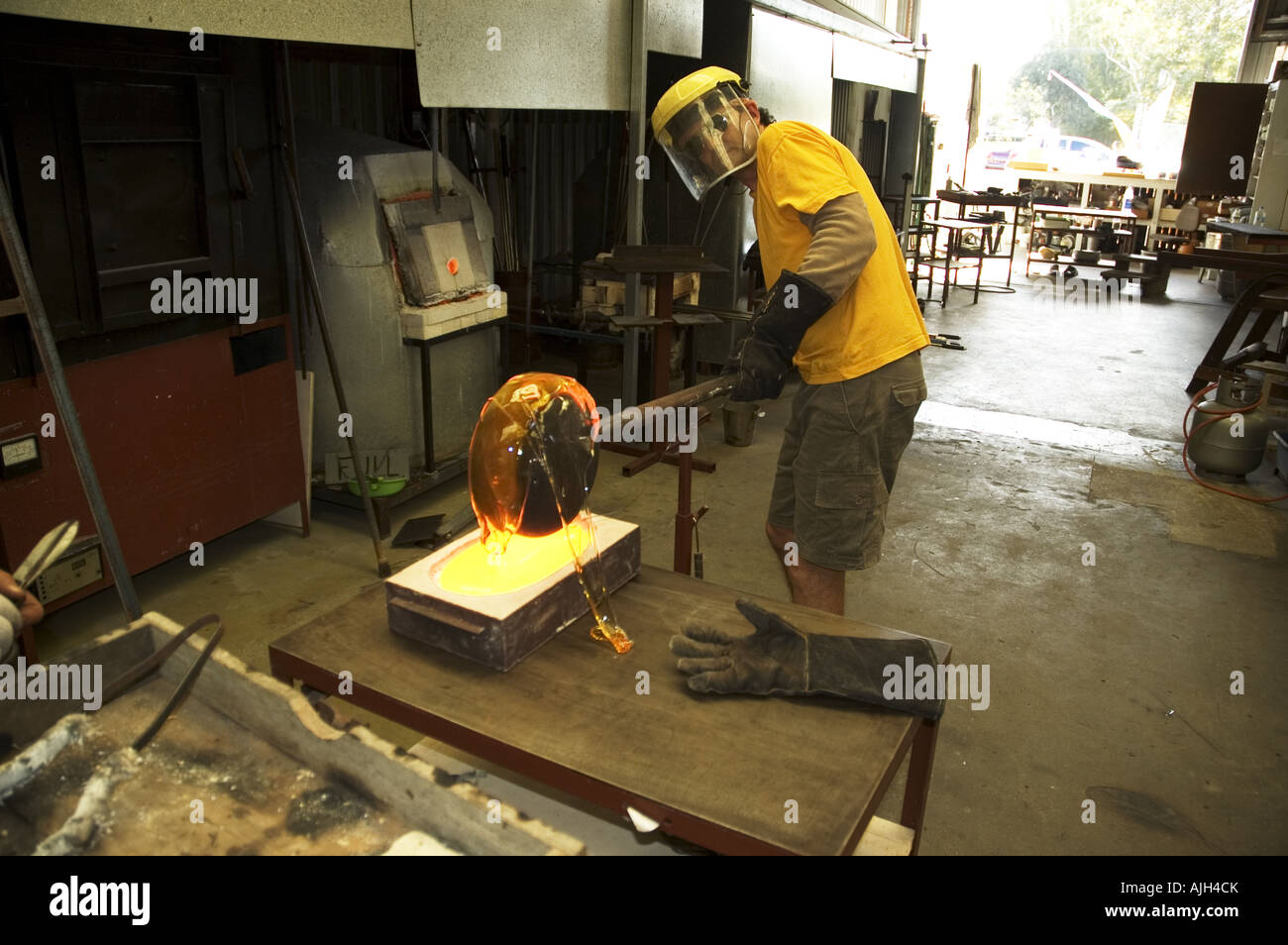 pouring molten glass Stock Photo - Alamy