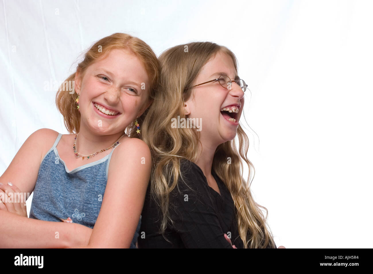 Two Laughing Girls Stock Photo - Alamy