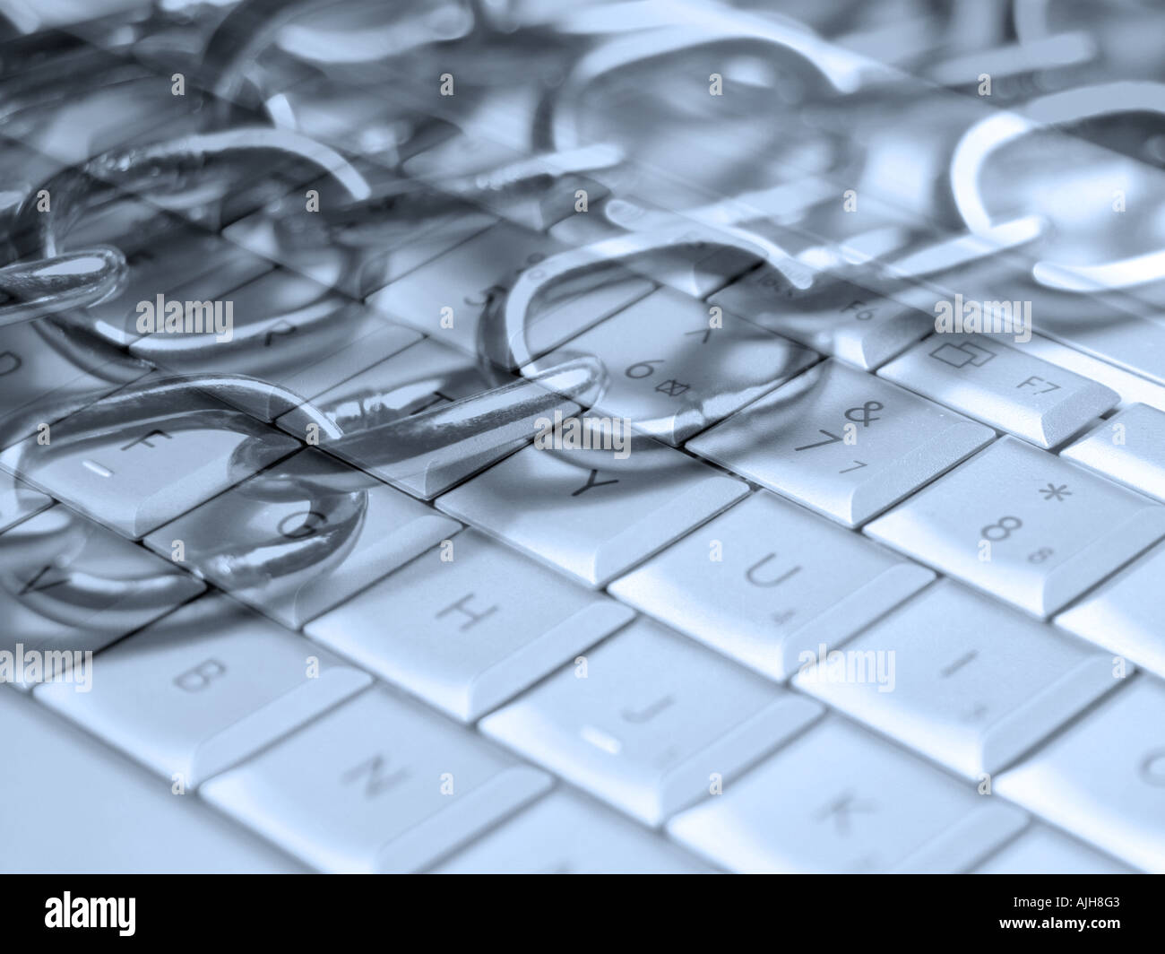 Chained to computer Stock Photo - Alamy