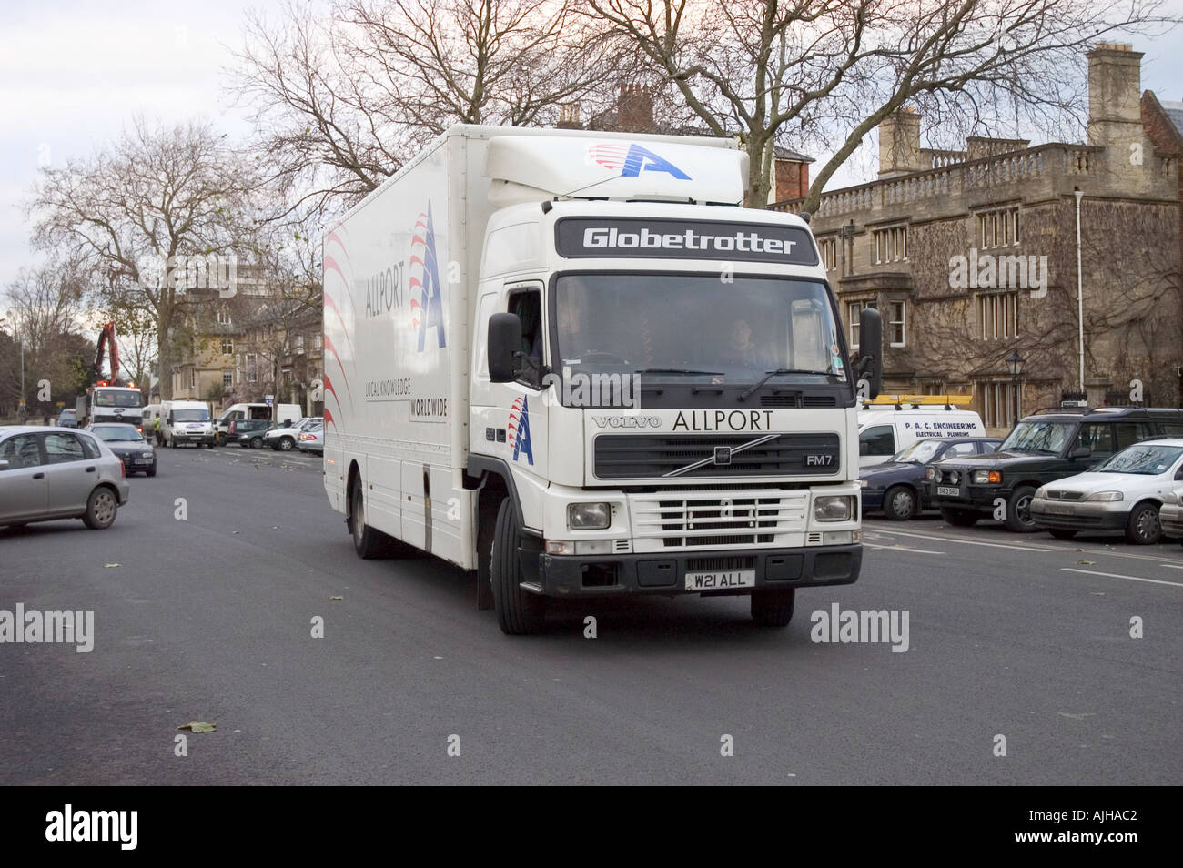 White articulated removal lorry Stock Photo - Alamy