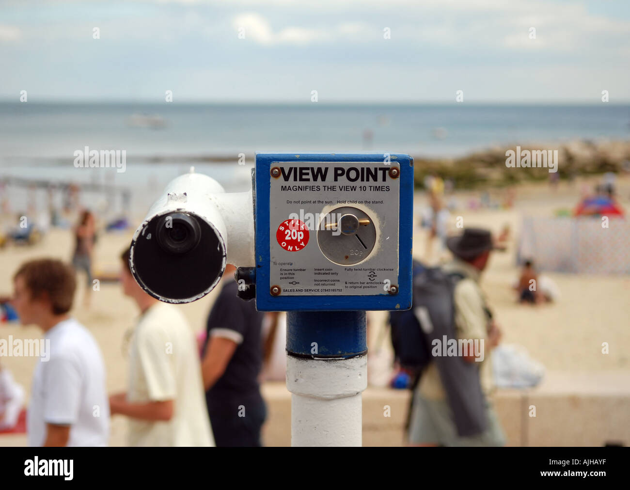 Telescope overlooking Lyme Regis beach, Dorset UK Stock Photo - Alamy
