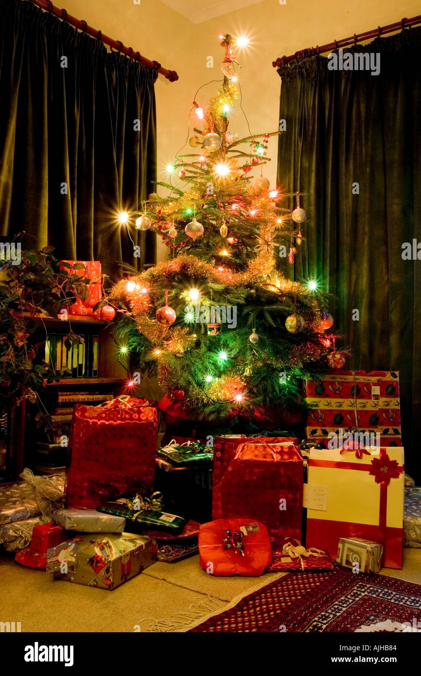 Christmas lights wrapped around tree hi-res stock photography and ...