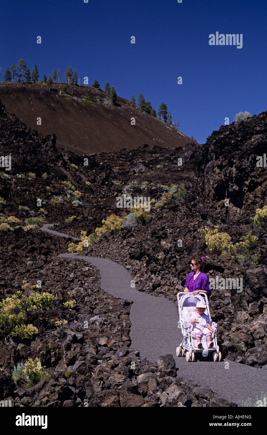 Lava Land trail with mother and baby in stroller along path Bend Oregon ...