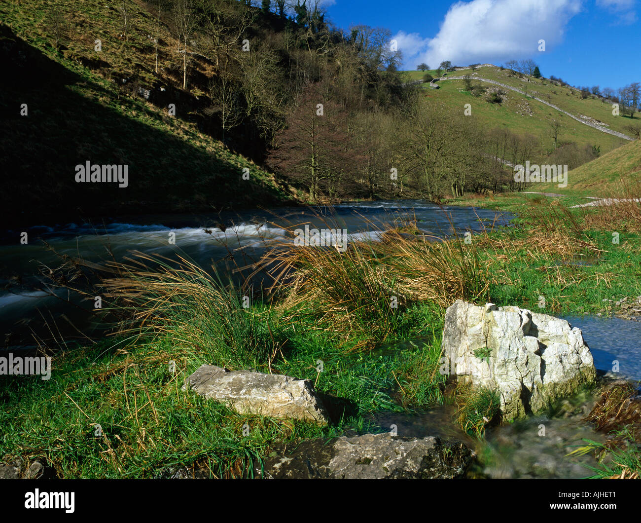 The River Dove running through Milldale in the Derbyshire Peak District ...