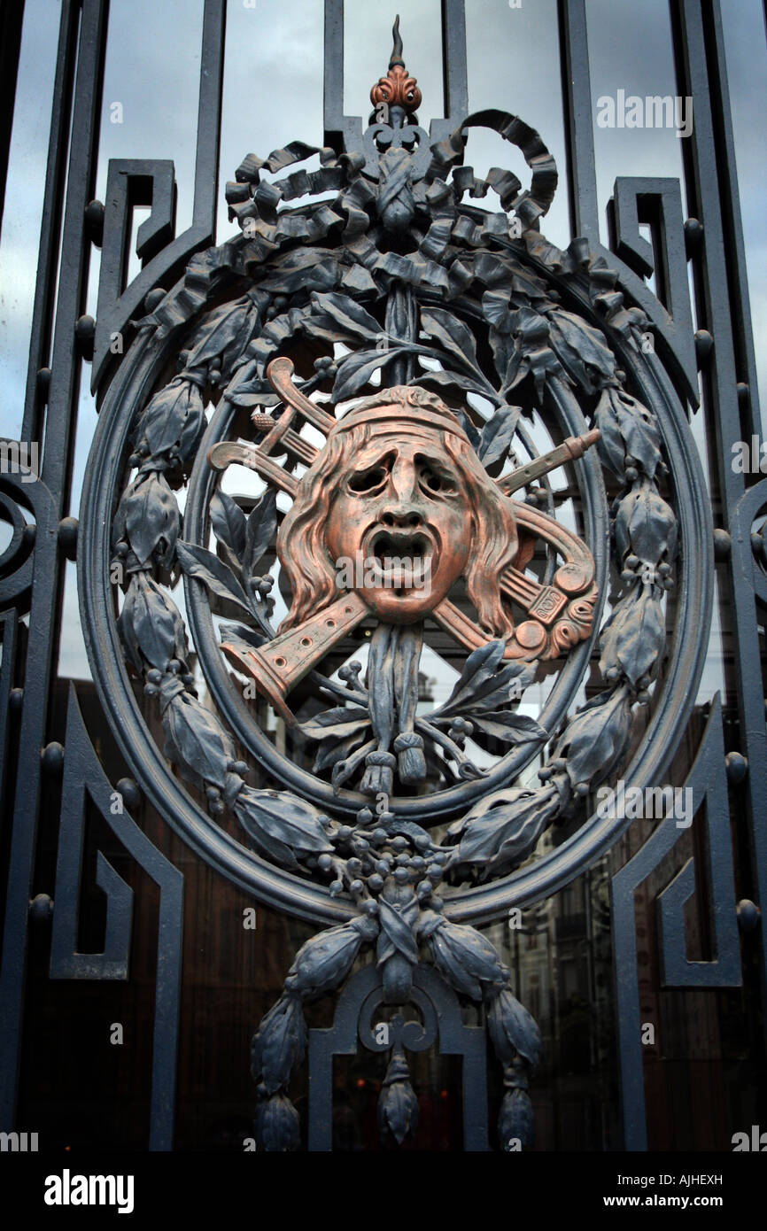 Metal gate with face with open mouth, Lille, France Stock Photo - Alamy