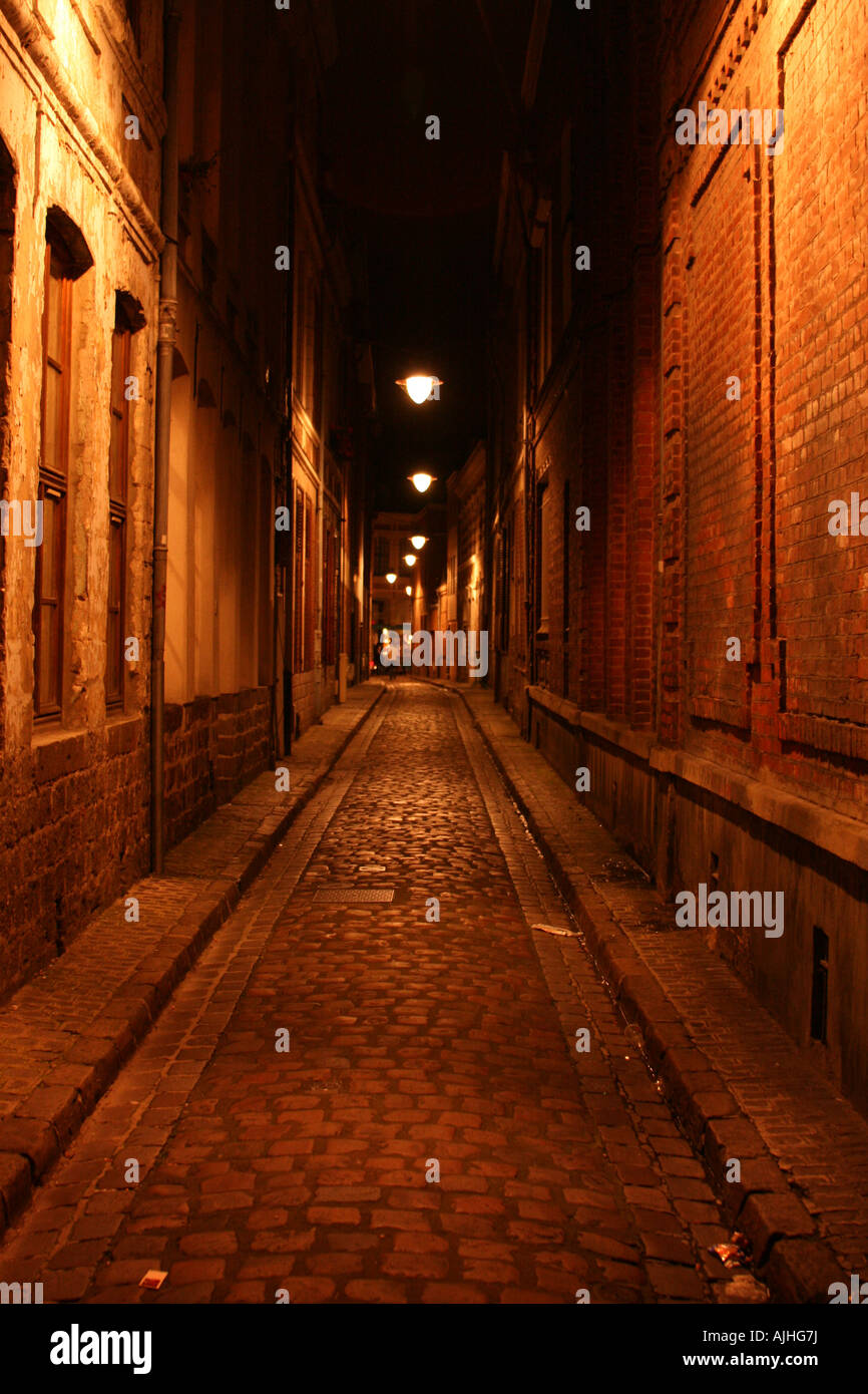 Dark alley in the backstreets of Lille, France Stock Photo - Alamy