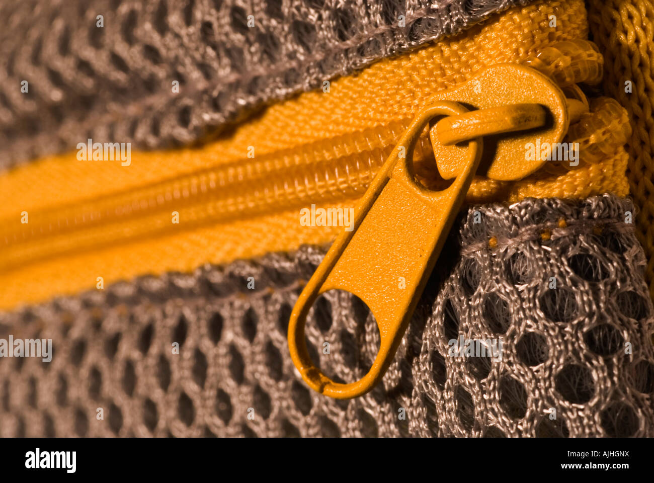 Yellow zip hi-res stock photography and images - Alamy