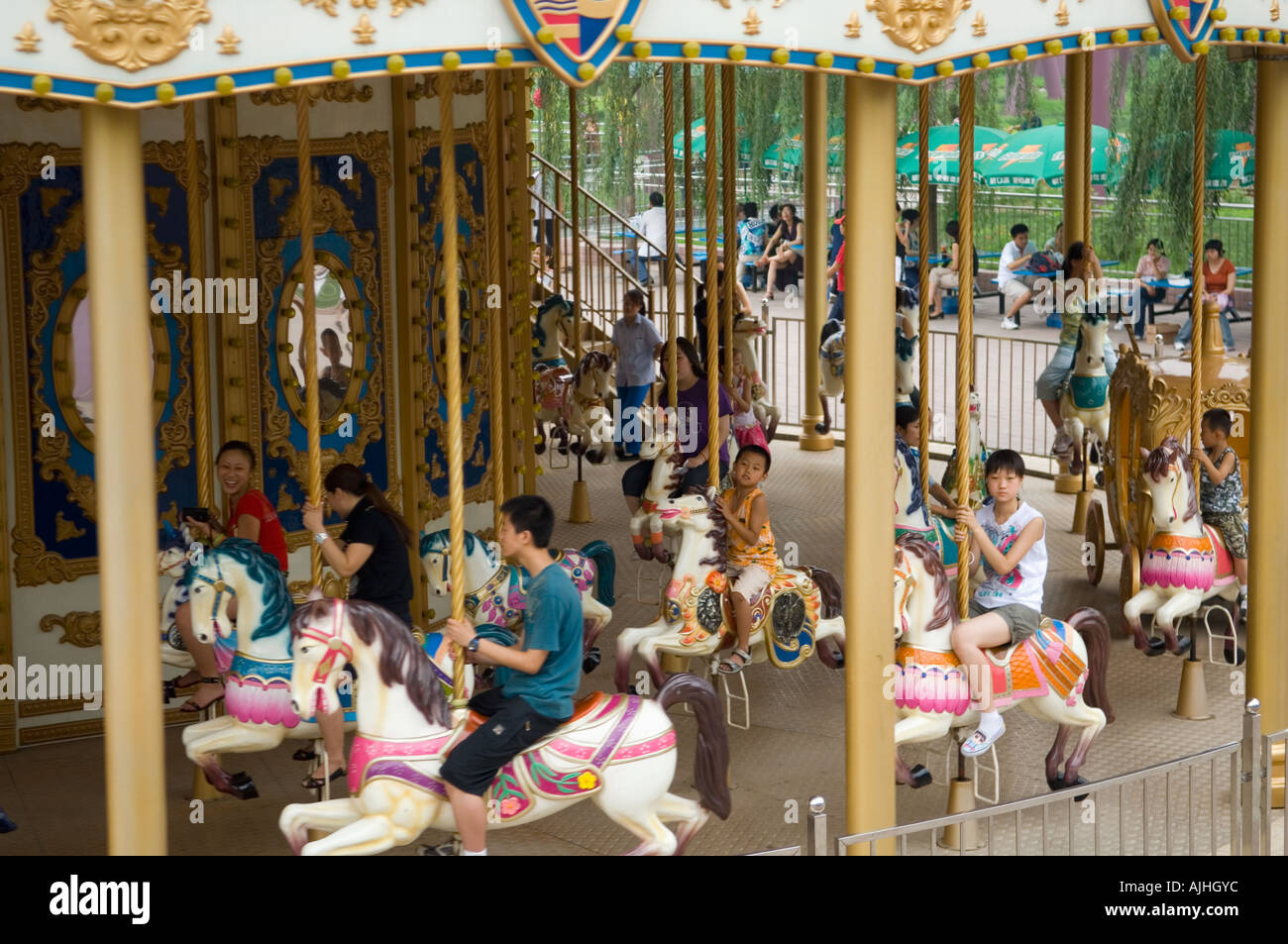 People on Carousel Rides in Shijingshan Park Beijing China Stock Photo ...