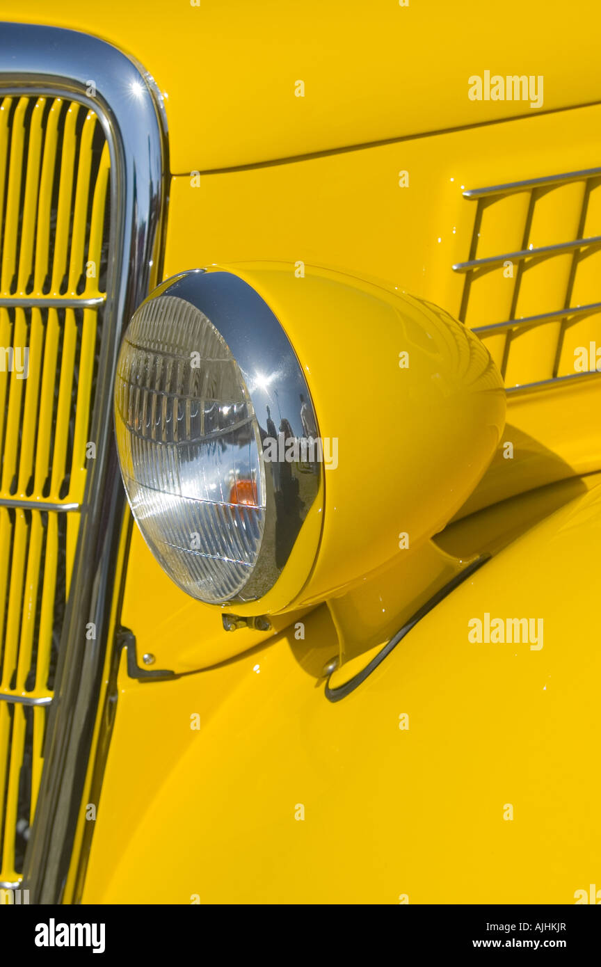 headlamp on yellow hotrod Stock Photo - Alamy