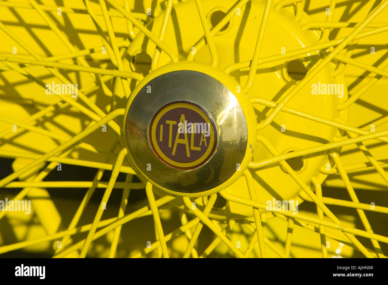 Yellow wheel spokes Stock Photo - Alamy