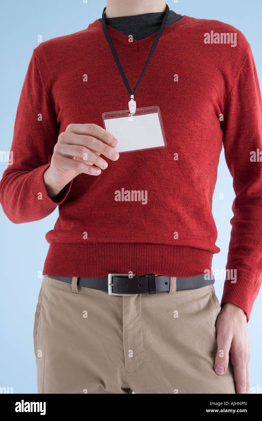 Man wearing ID card Stock Photo - Alamy