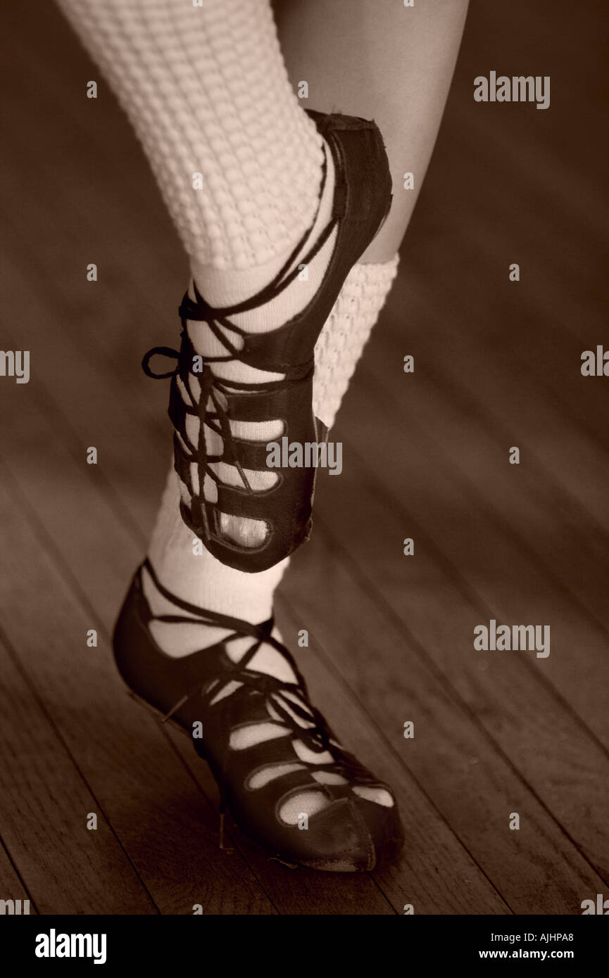 A young girl doing an Irish dance with soft shoes Stock Photo - Alamy