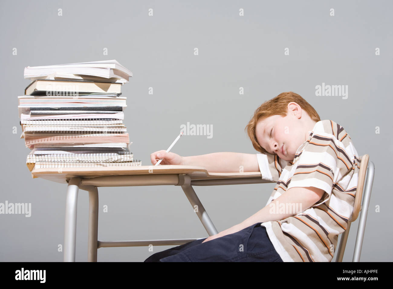 Boy asleep at his desk Stock Photo - Alamy Boy asleep at his desk Stock Photo - Alamy