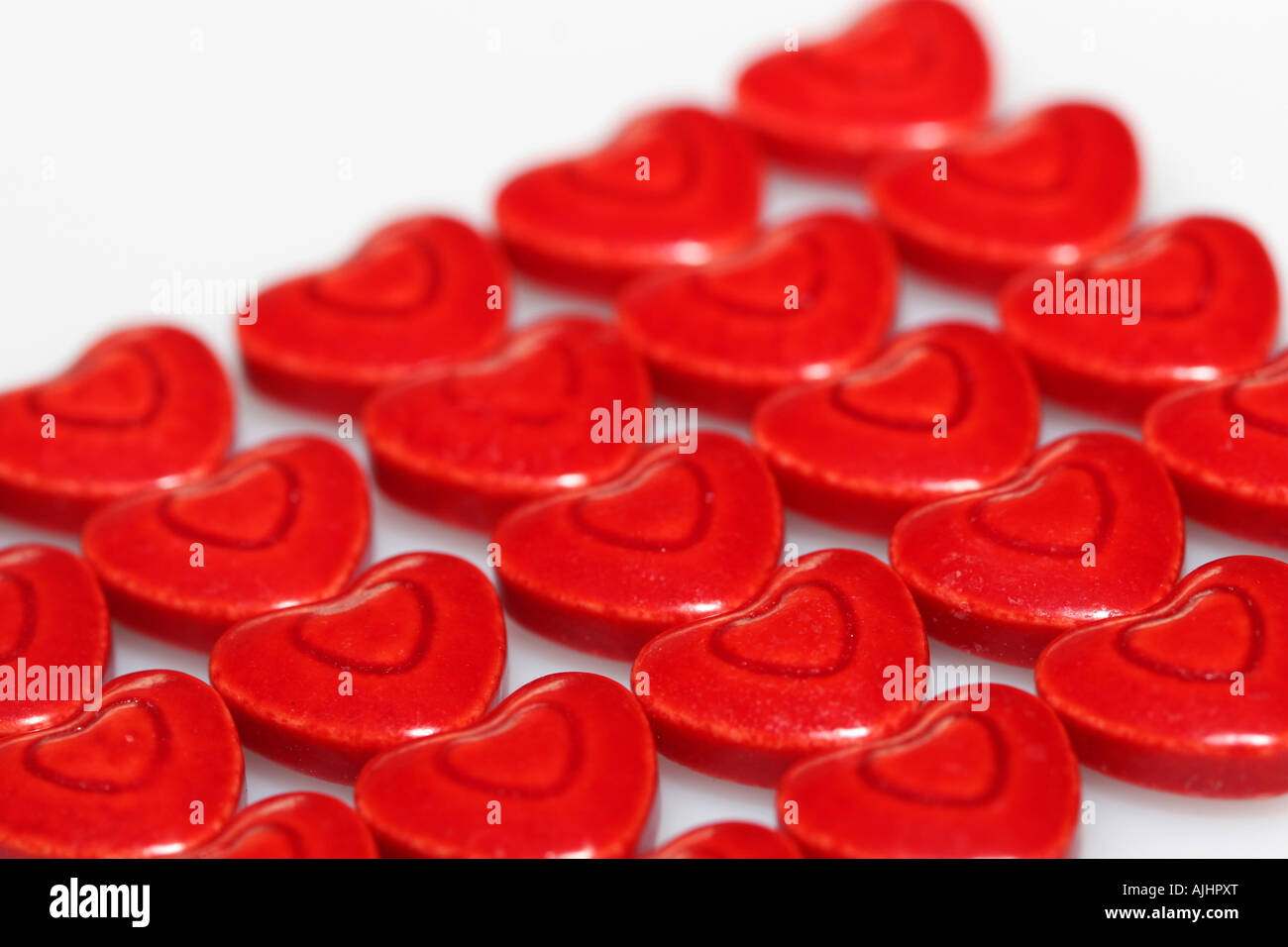 A close up of very red heart shaped candies Stock Photo - Alamy