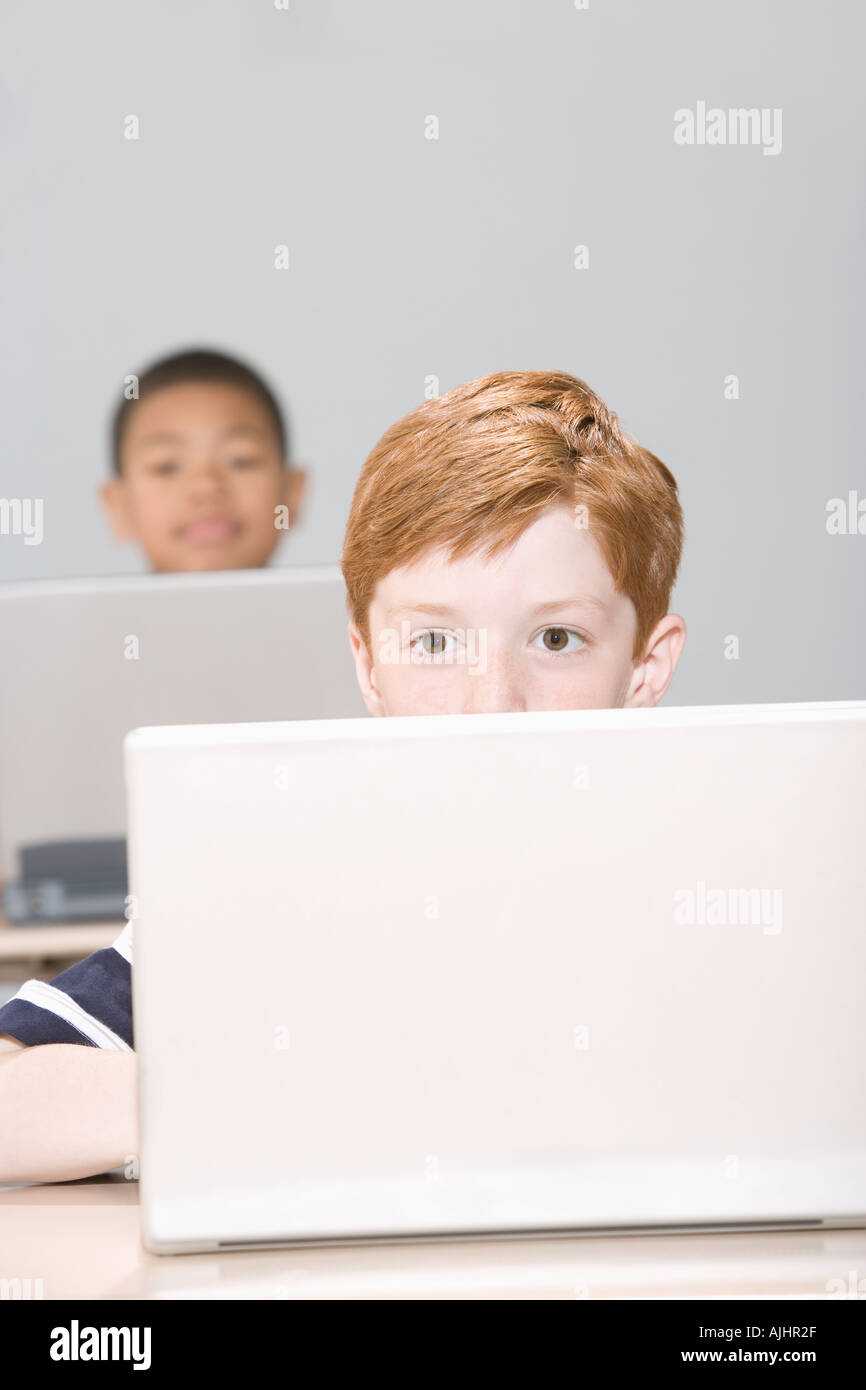 Boys using laptop computers Stock Photo - Alamy