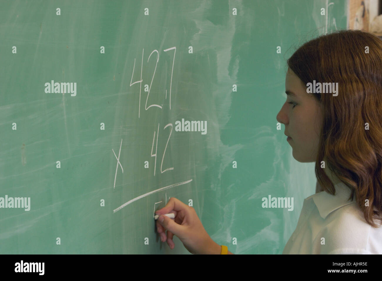 Boy working on math problem hi-res stock photography and images - Alamy
