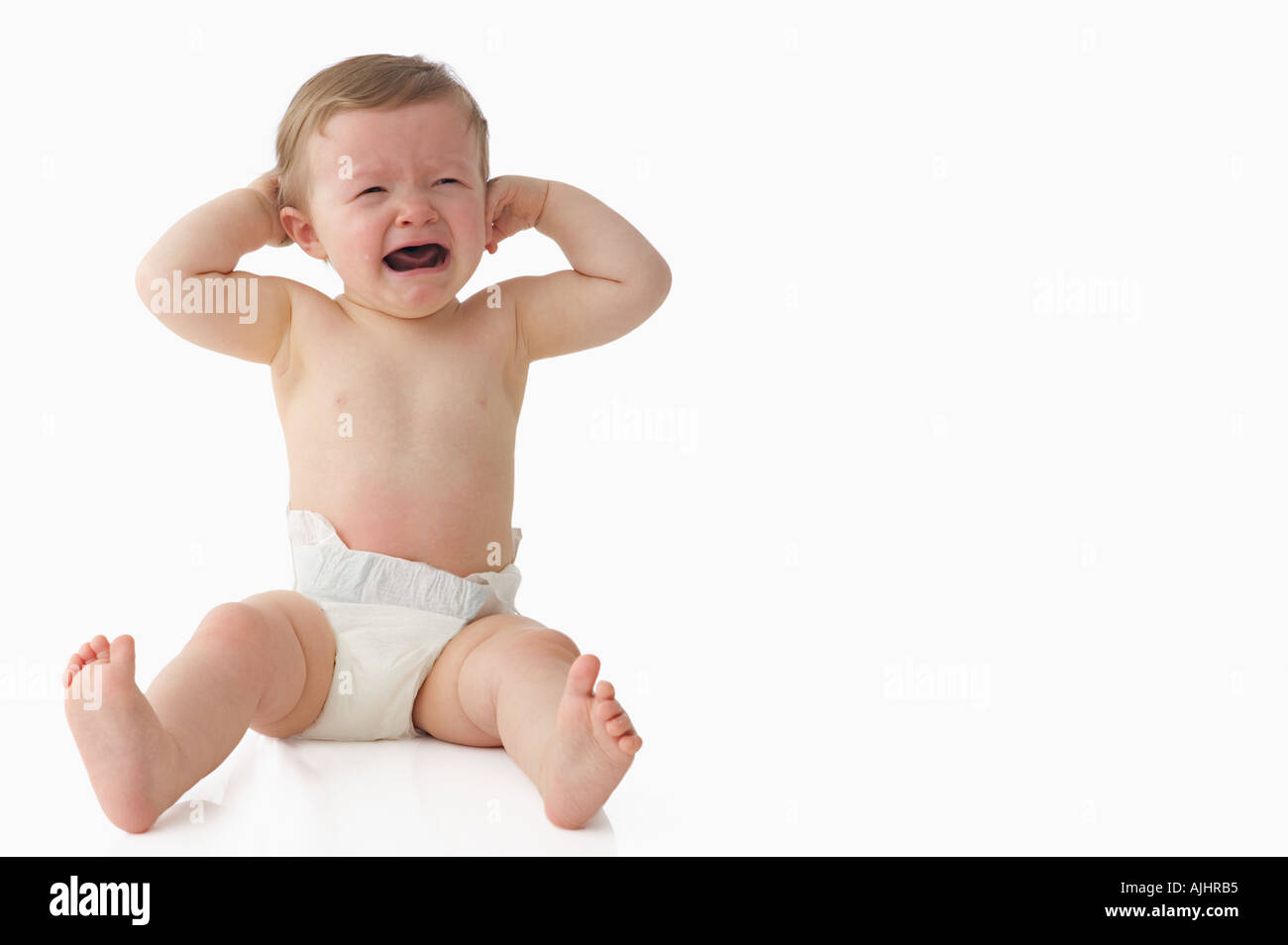 Baby crying alone hi-res stock photography and images - Alamy