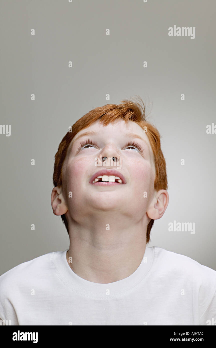 Boy looking up Stock Photo - Alamy
