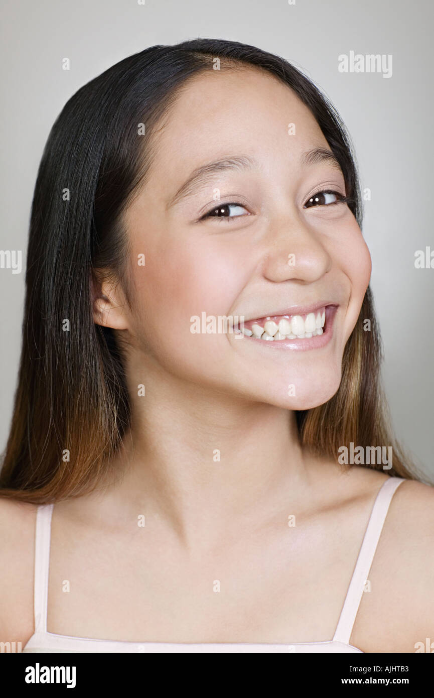 Cute asian girl grinning hi-res stock photography and images - Alamy