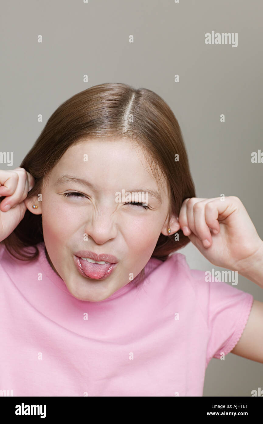Girl making a face Stock Photo - Alamy