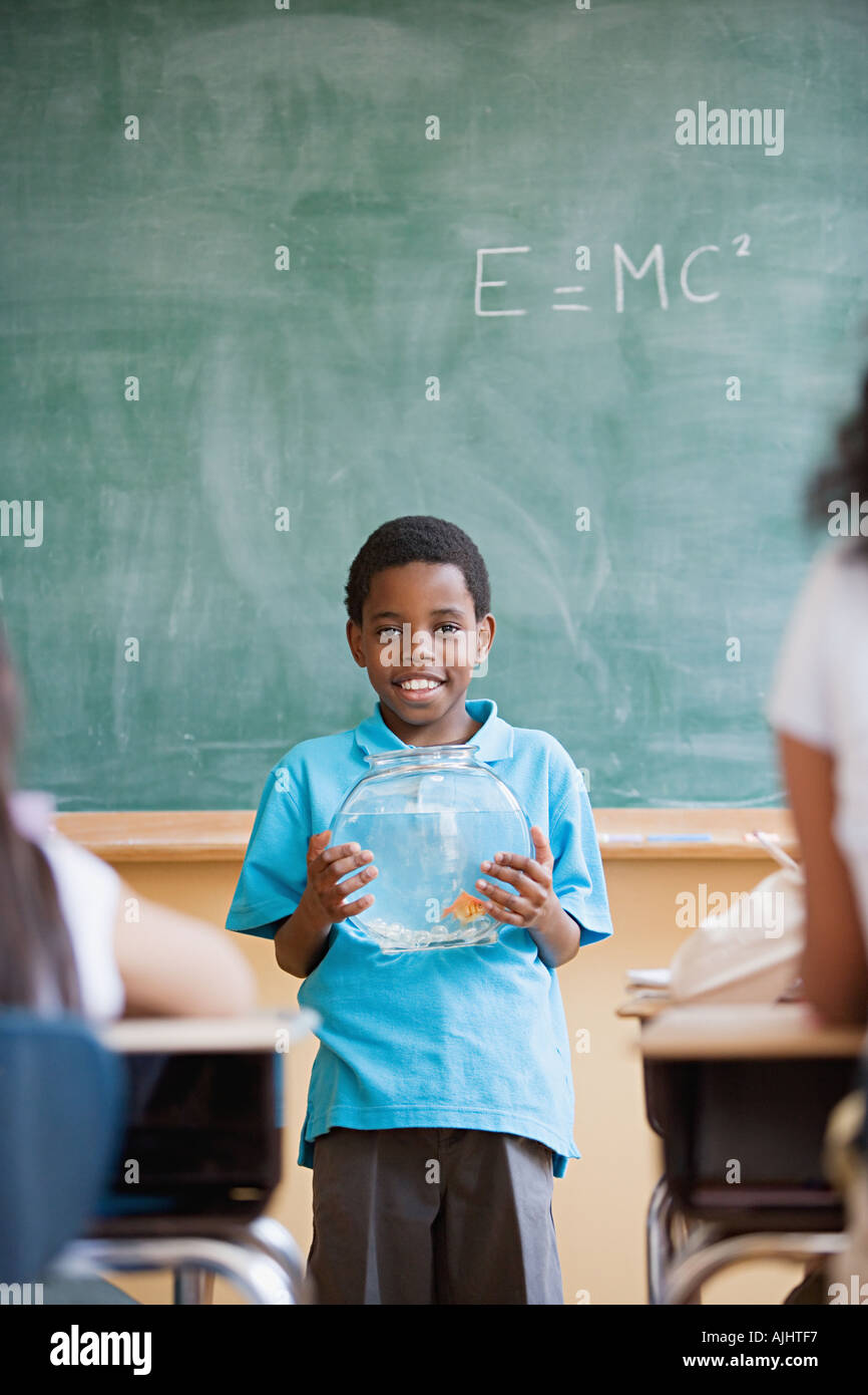 Schoolboy giving a presentation in classroom Stock Photo - Alamy
