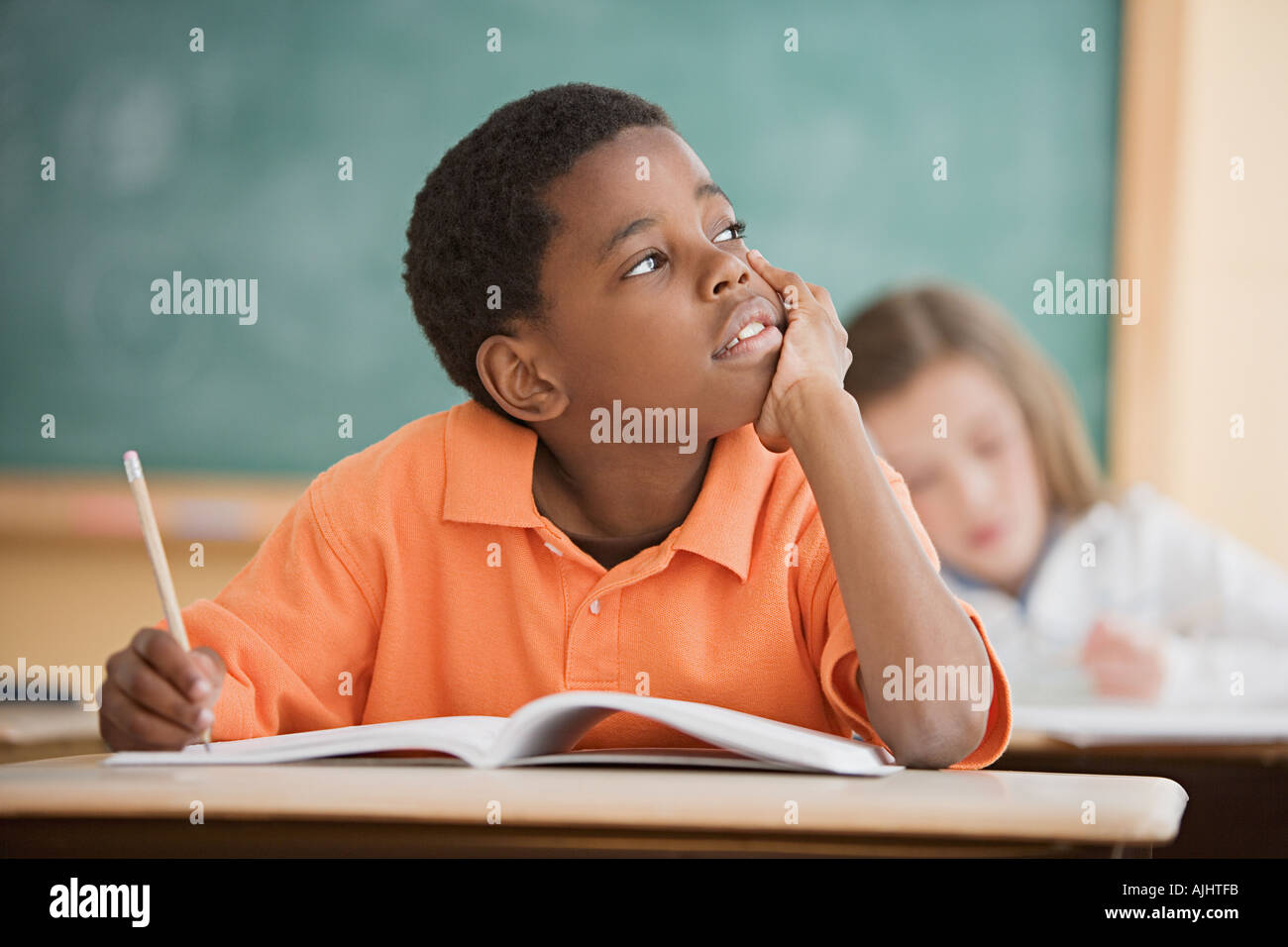 Child daydreaming classroom hi-res stock photography and images - Alamy