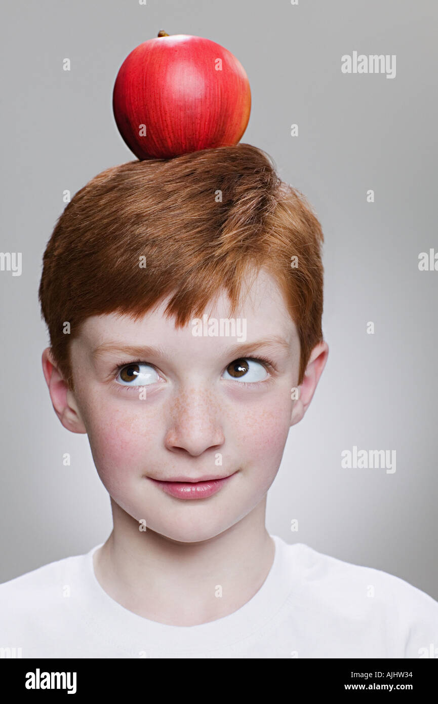 Balancing on apple hi-res stock photography and images - Alamy