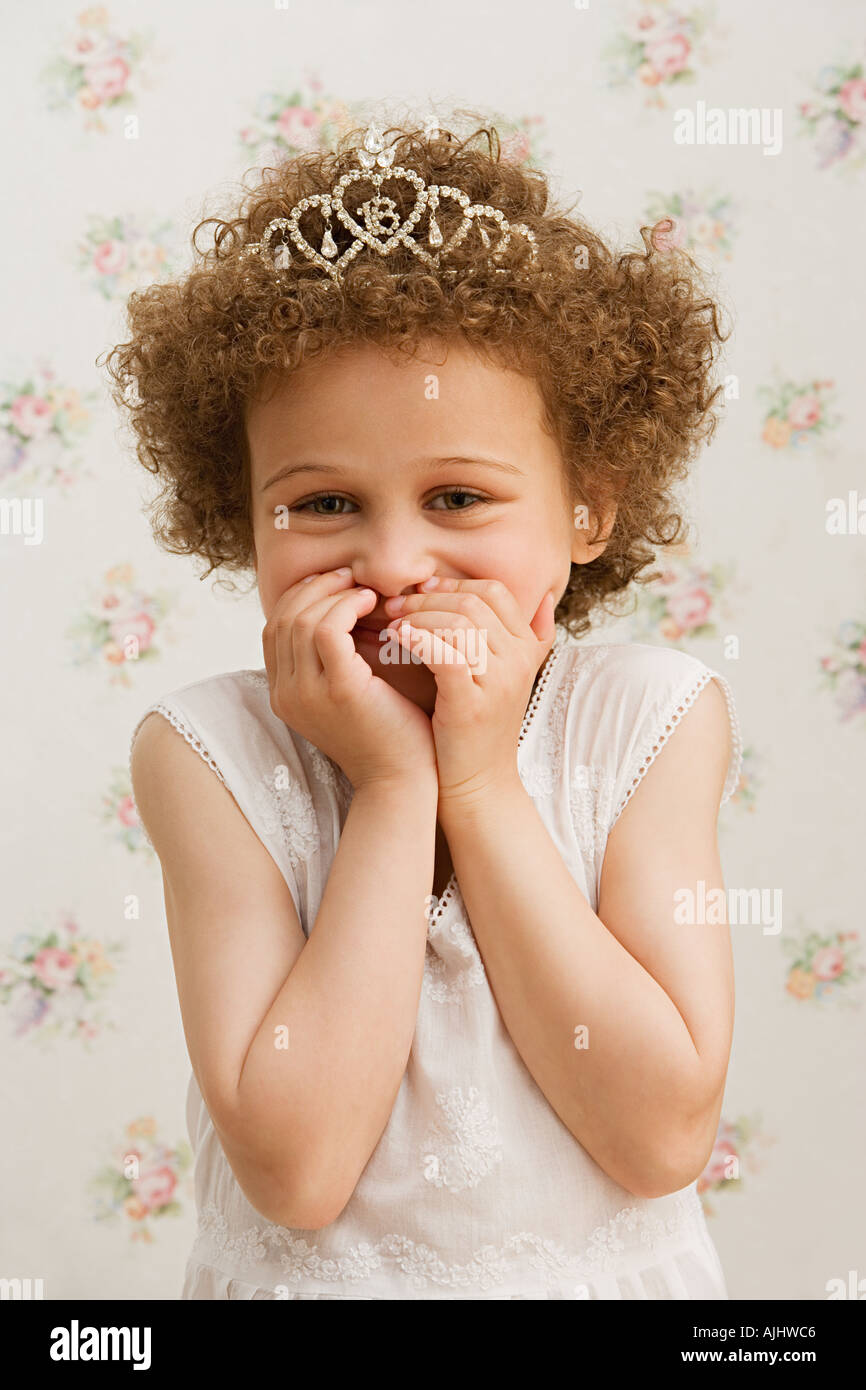 Cute girl giggling Stock Photo - Alamy