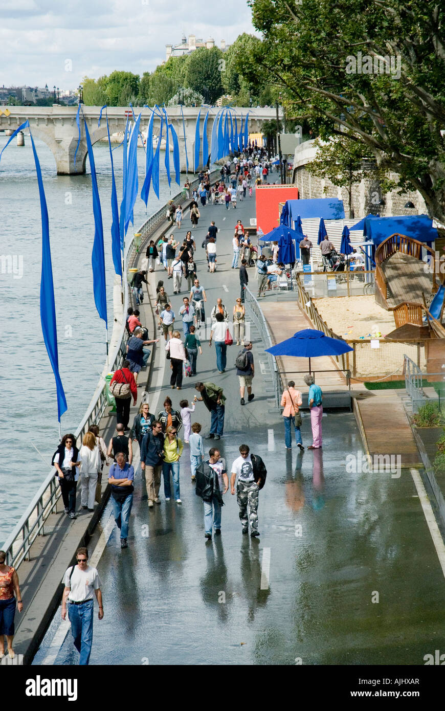 Paris plage is an annual event when one bank of the Seine becomes a ...