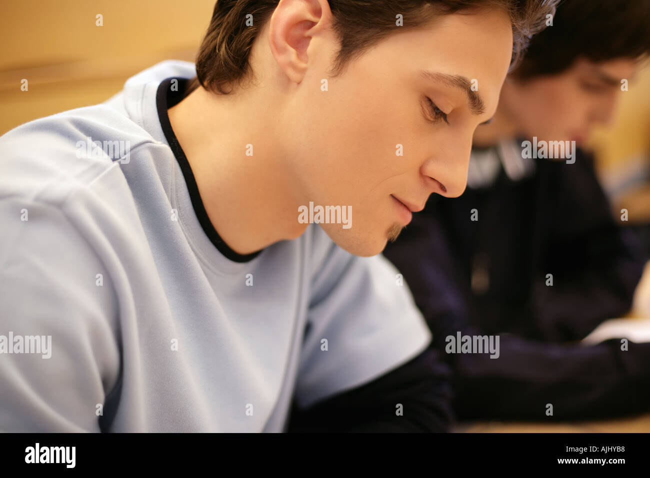 Two young men in a lecture Stock Photo - Alamy