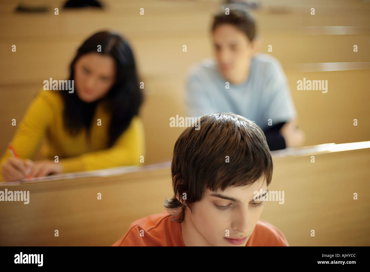 Group three students sitting hi-res stock photography and images - Alamy