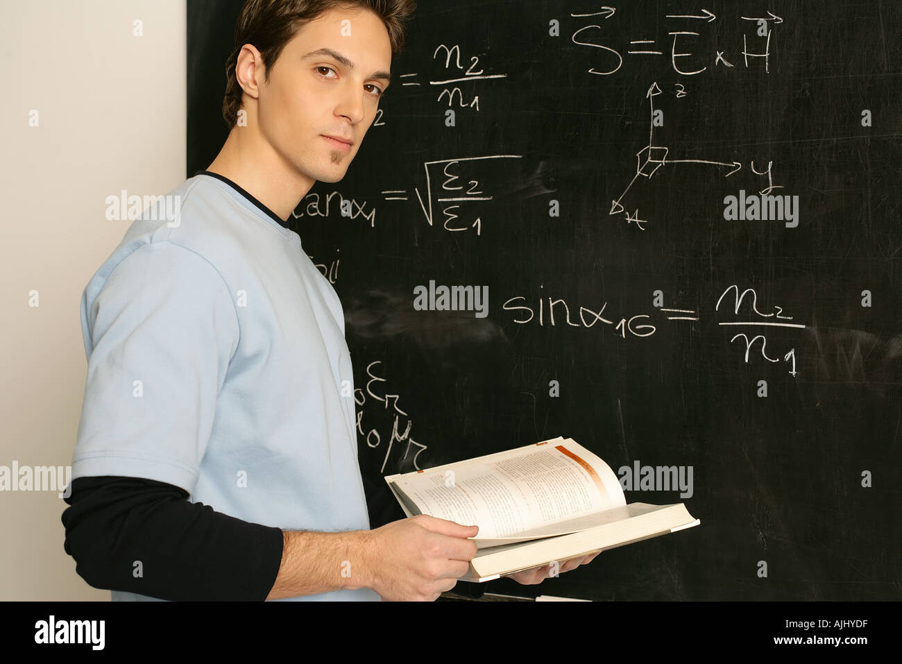 Student standing front class reading hi-res stock photography and ...
