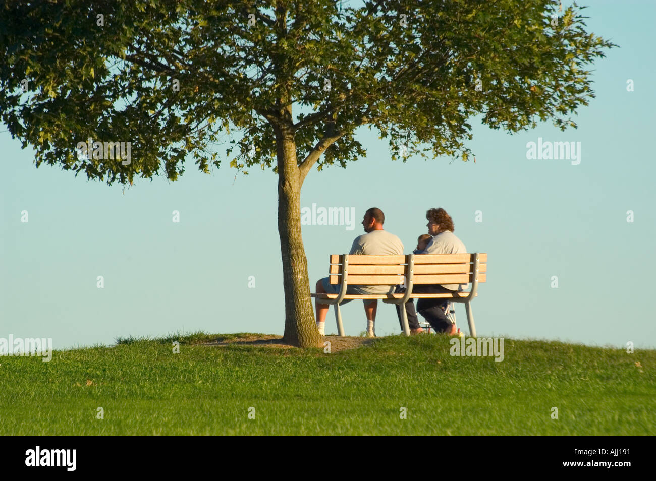 People on Bench Stock Photo - Alamy