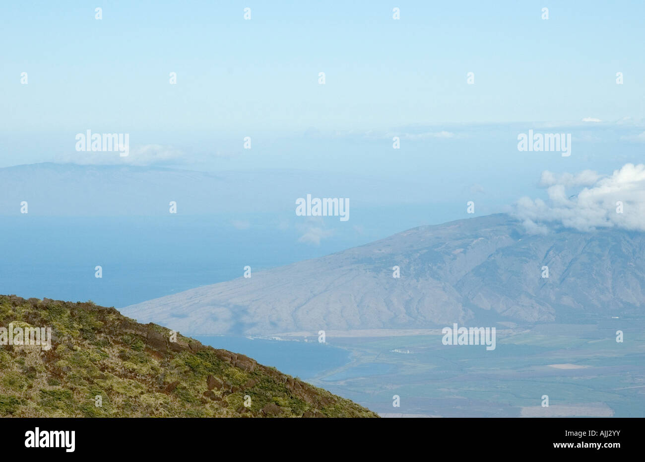 Sunrise (dawn) and view of West Maui and Lanai seen from the summit of ...