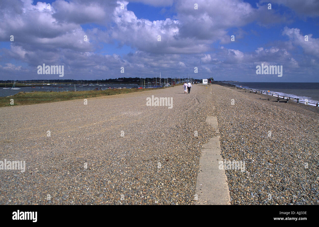 Sea wall nearly submerged by shingle beach Slaughden Aldeburgh Suffolk ...