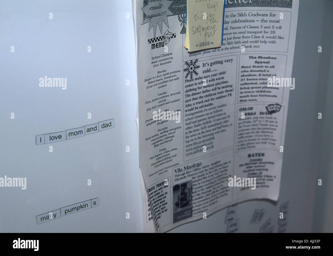 Notices on domestic fridge Stock Photo - Alamy