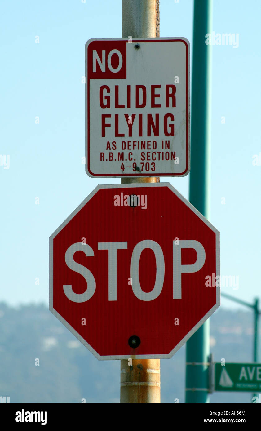 Red and White No Glider Flying and Stop Sign on the Sidewalk Redondo ...