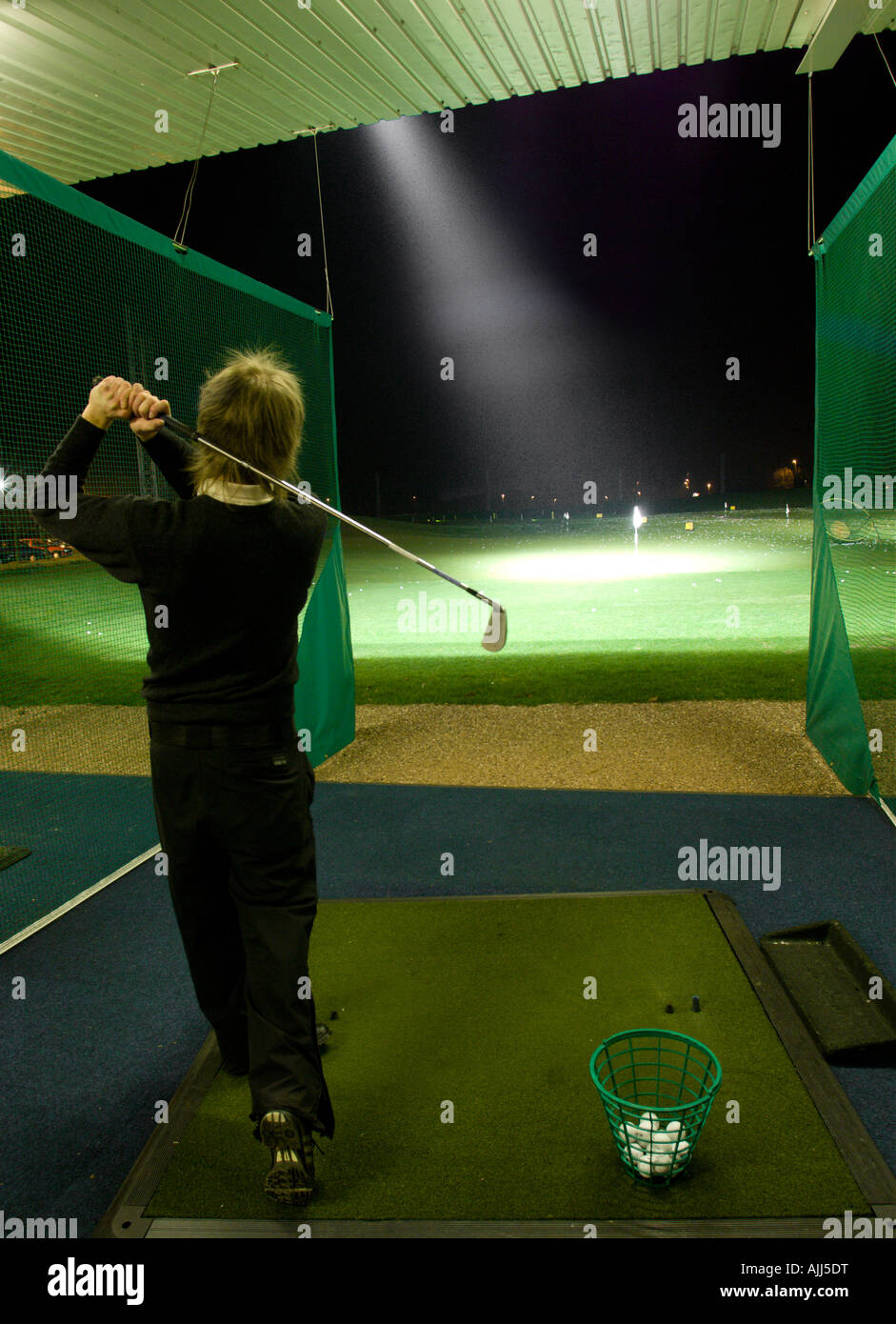 Night Driving range session Stock Photo - Alamy