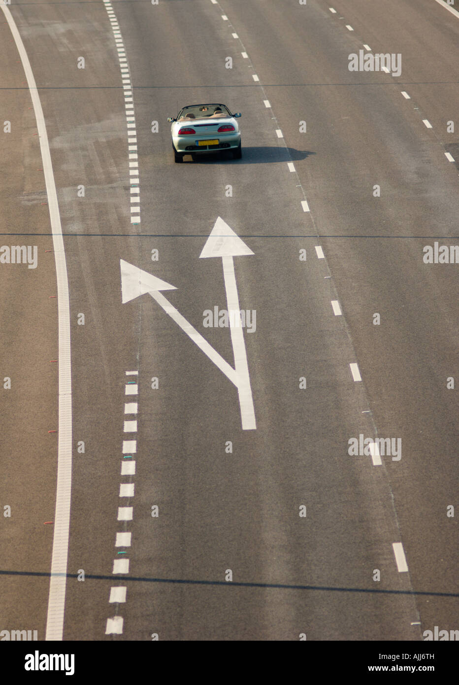 car driving down motorway Stock Photo - Alamy