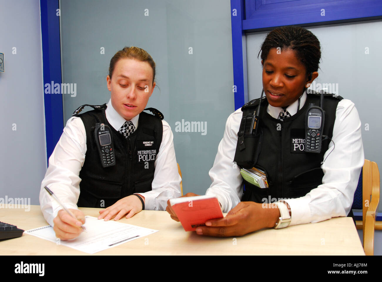 Female Special Police Officers writing up witness statement at Kingston ...