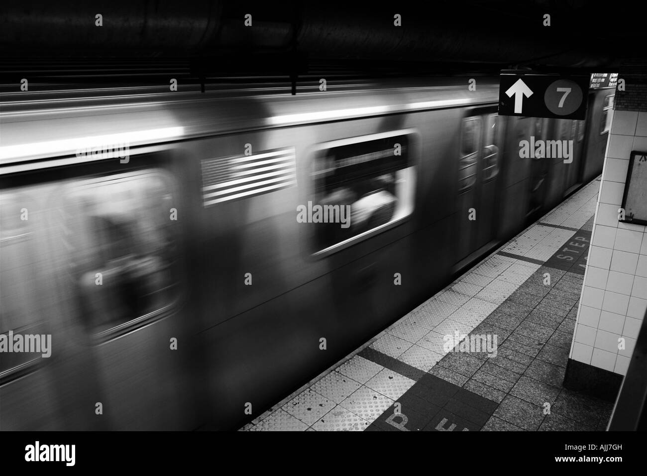 USA NY New york city Manhattan Subway station with a train rushing ...