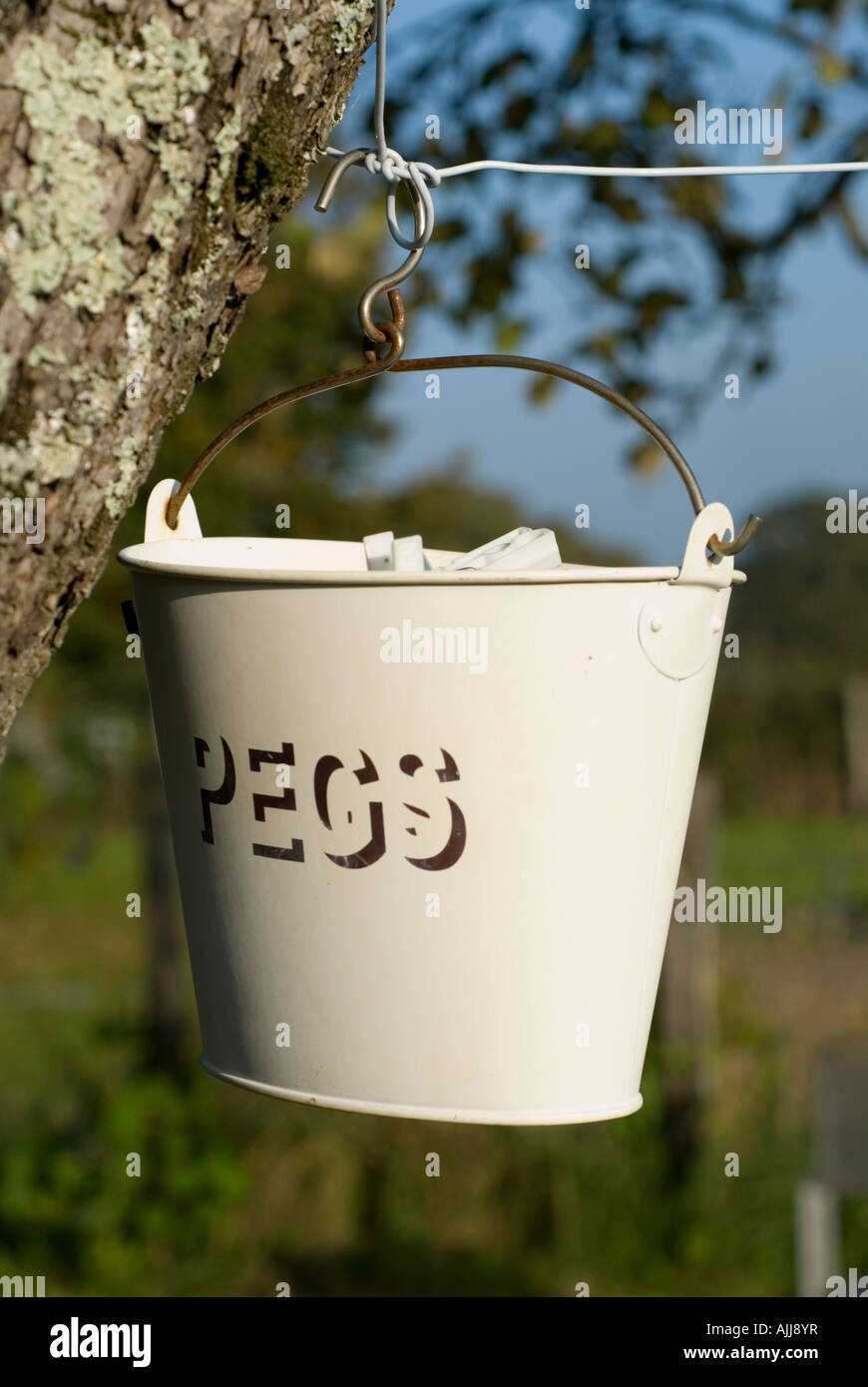 Stock Photo of a washing peg bin hanging on a washing line Stock Photo ...