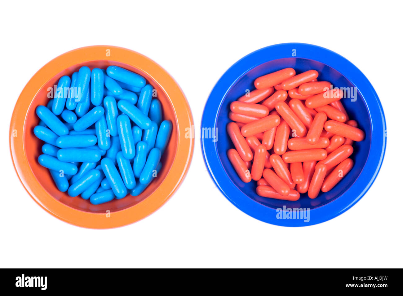 orange and blue bowls with sweets Stock Photo - Alamy