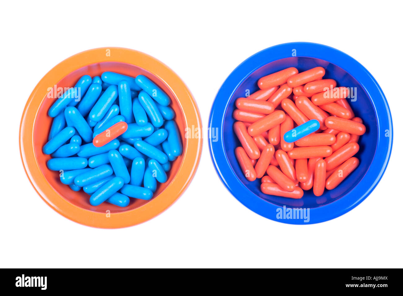 orange and blue bowls with sweets Stock Photo - Alamy