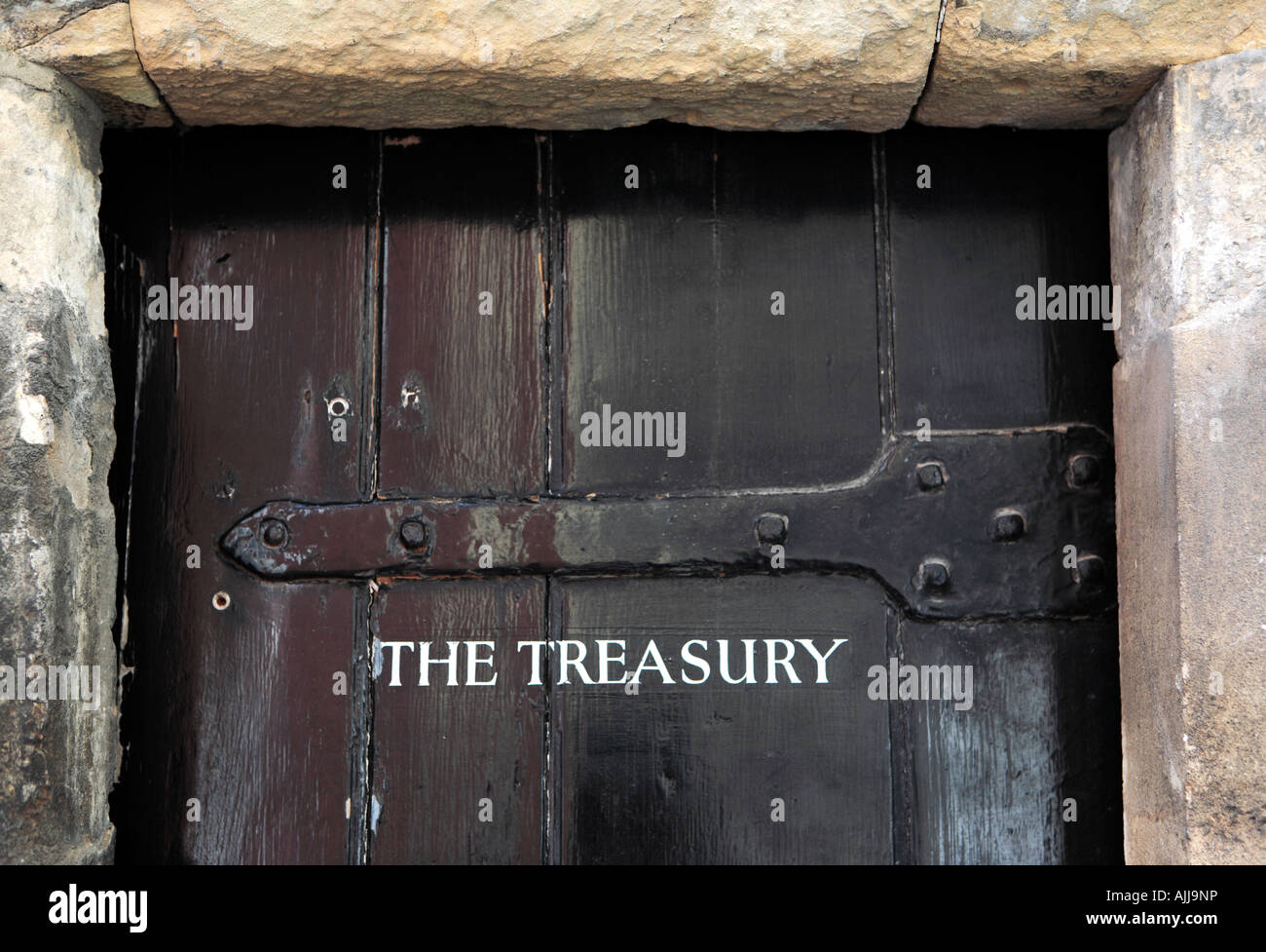 Old door with Treasury sign Stock Photo - Alamy