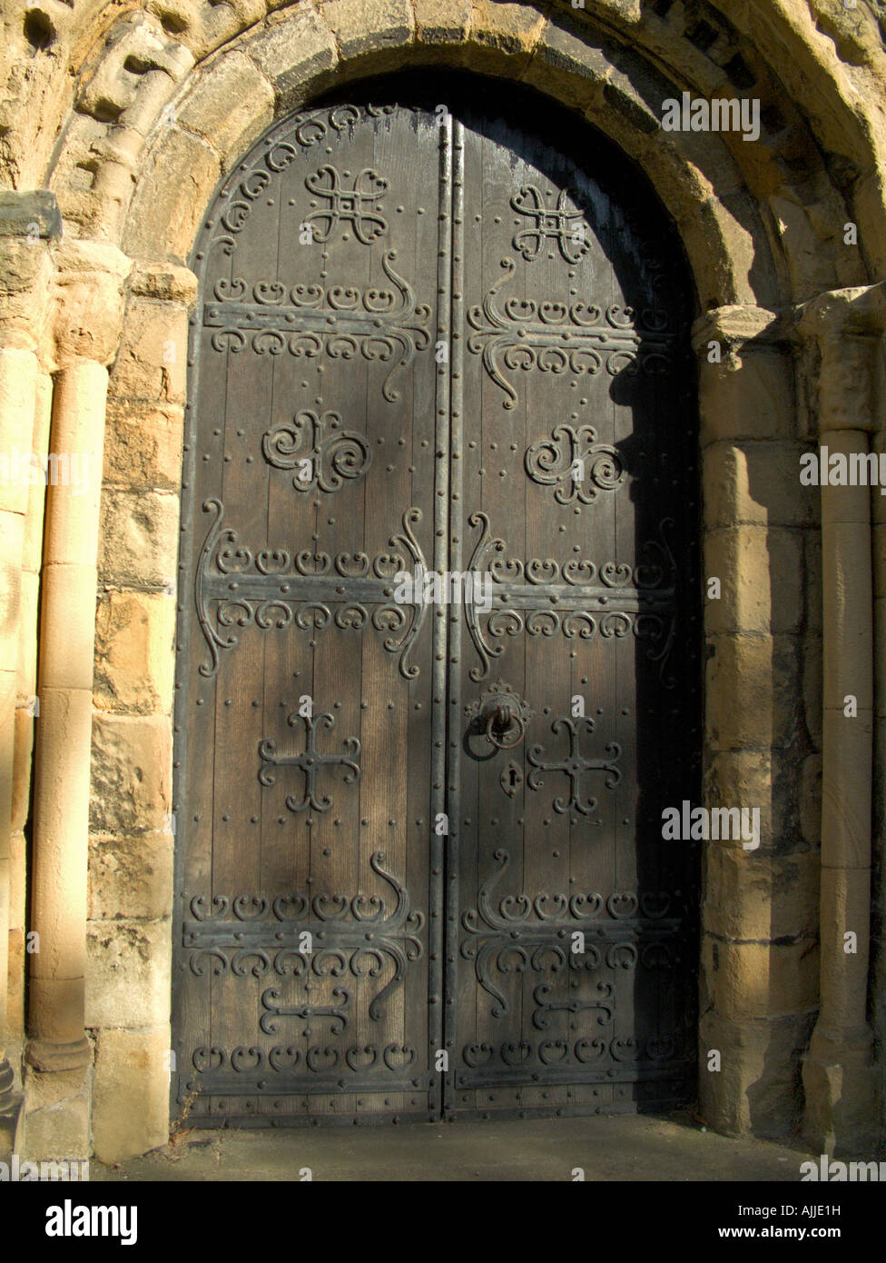 Wooden Church door archway of Norman origin at Bakewell in Derbyshire ...