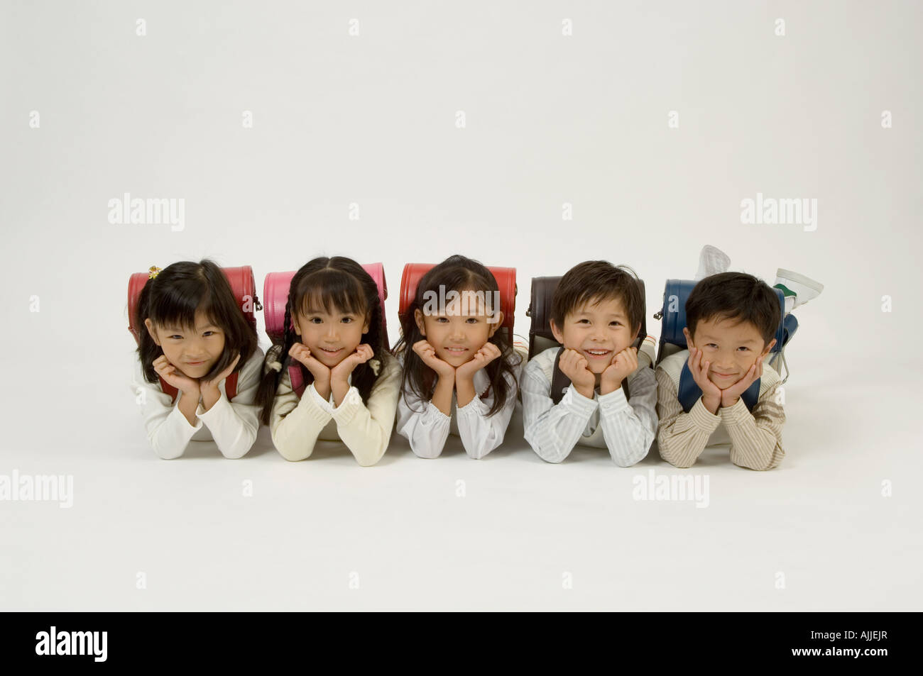 Five elementary age children Stock Photo - Alamy